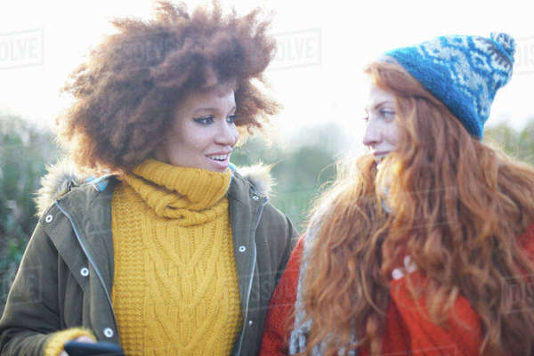 Friends face to face smiling - Royalty-free Stock Photo | Dissolve