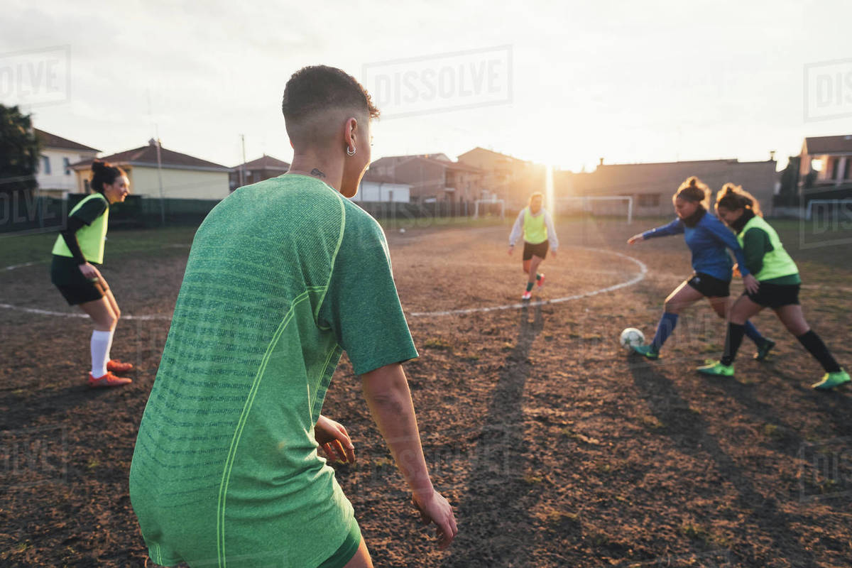 Football players playing on football pitch - Royalty-free Stock Photo ...