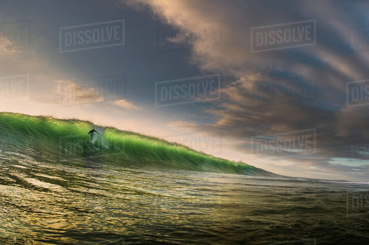 Surfer surfing on barreling wave, Crab Island, Doolin, Clare, Ireland ...