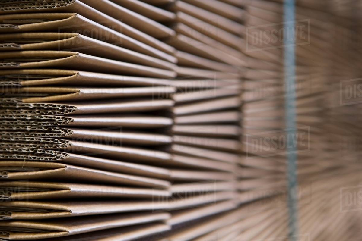 Close up of cardboard stock warehouse - Stock Photo - Dissolve