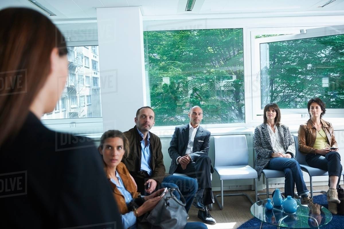 Group of people waiting for interview - Stock Photo - Dissolve