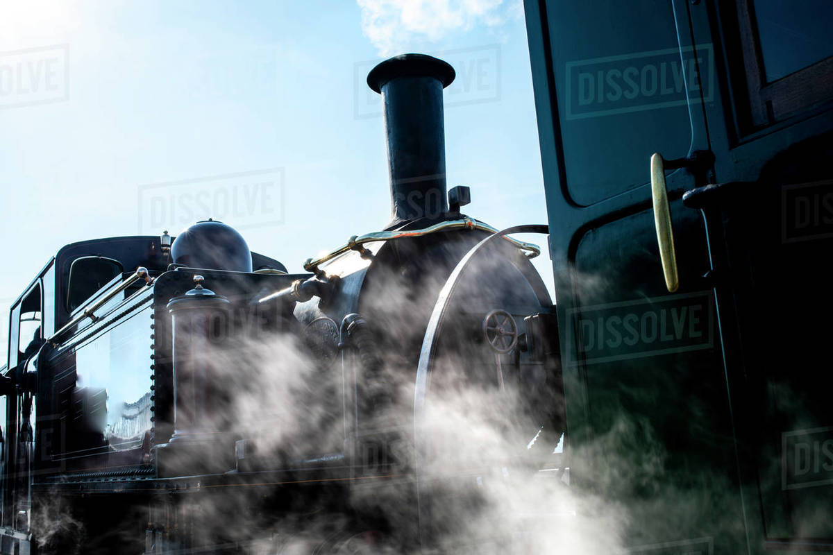 Steam train emitting clouds of smoke and steam - Royalty-free Stock ...