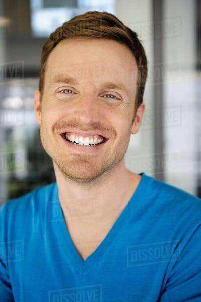 Close up of mans smiling face - Stock Photo - Dissolve