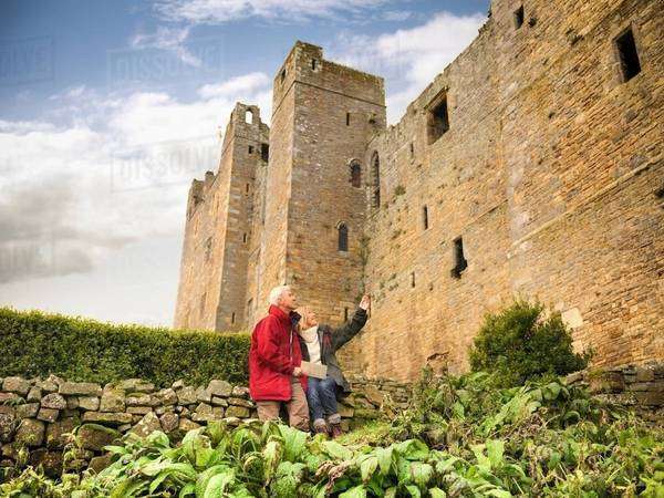 Couple visiting Bolton Castle, a 14th century Grade I listed building ...