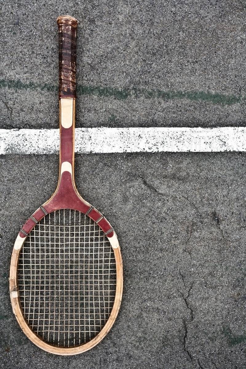 Tennis racket on court - Royalty-free Stock Photo | Dissolve