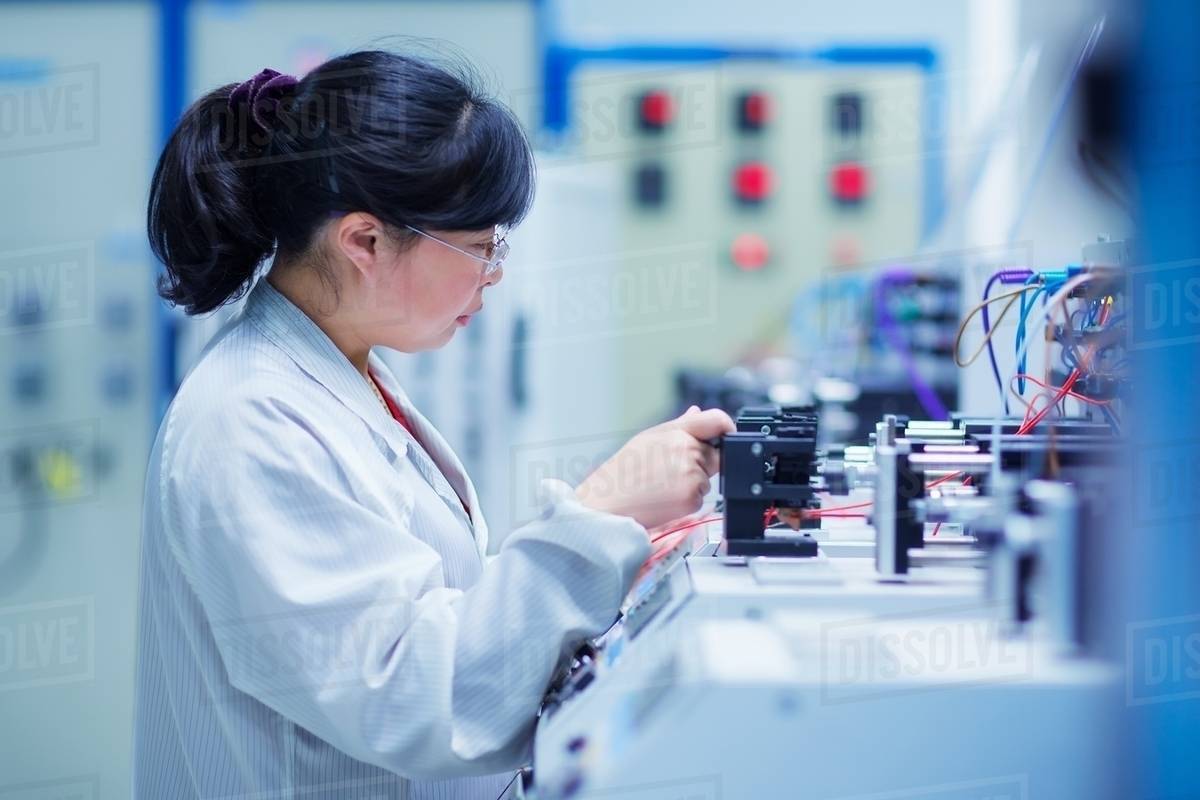 Worker at small parts manufacturing factory in China - Royalty-free ...