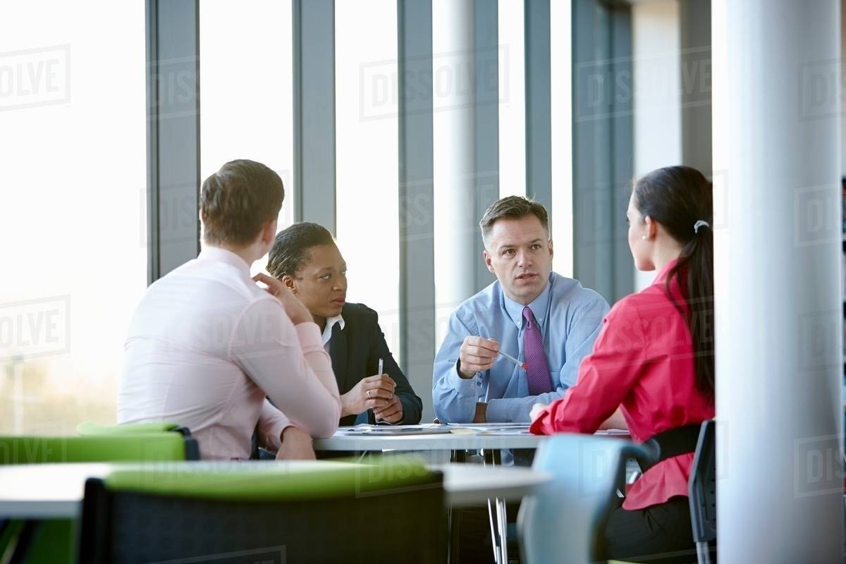 Business colleagues in meeting - Royalty-free Stock Photo | Dissolve