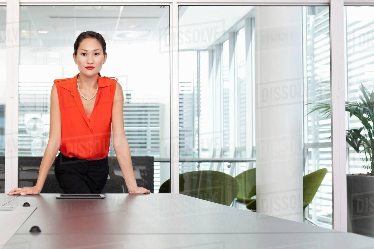 Portrait of female business manager in office - Royalty-free Stock ...