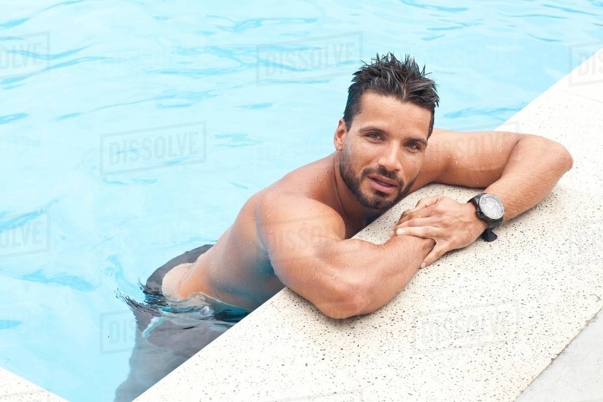 Man in pool - Stock Photo - Dissolve