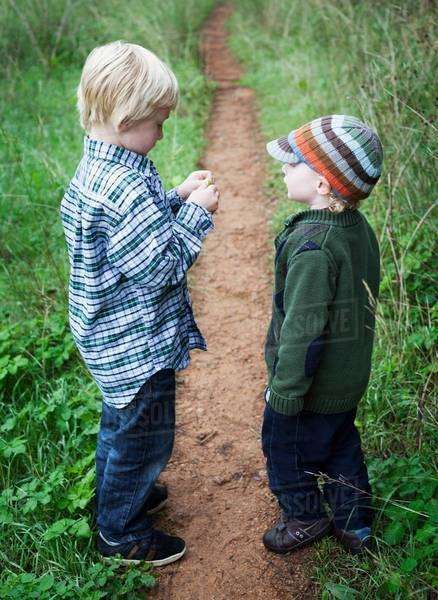 Brothers standing together, outdoors - Royalty-free Stock Photo | Dissolve
