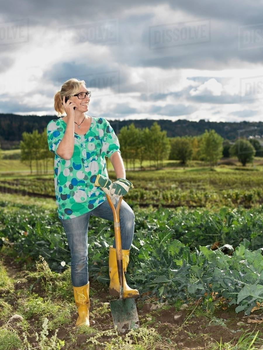 Girl with shovel - Royalty-free Stock Photo | Dissolve