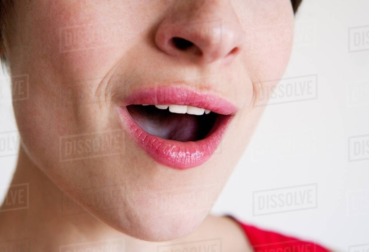 Close up of woman singing - Royalty-free Stock Photo | Dissolve