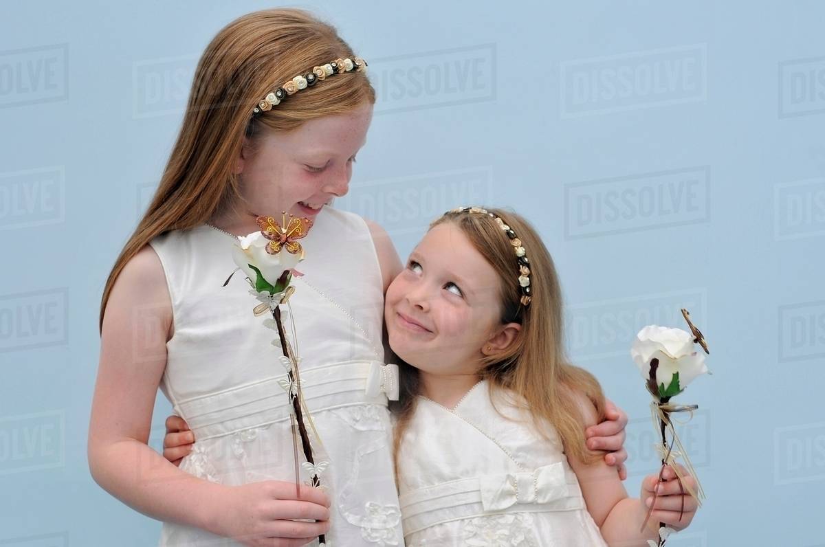 Smiling flower girls in wedding - Royalty-free Stock Photo | Dissolve