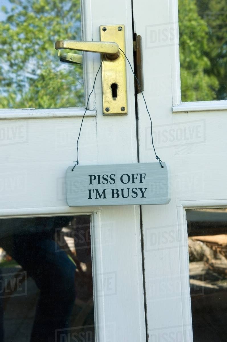 Busy sign on door - Royalty-free Stock Photo | Dissolve