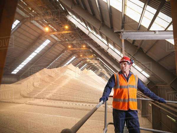 Worker at gypsum facility - Stock Photo - Dissolve