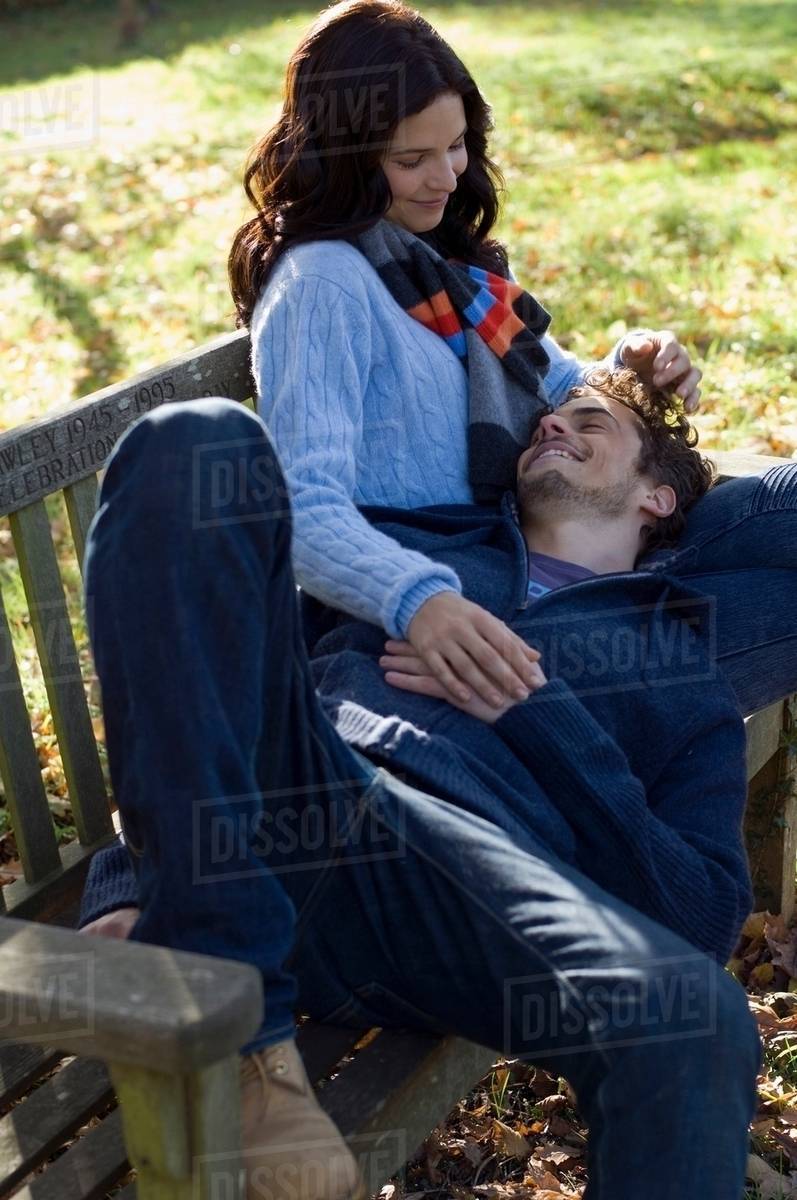 Man on woman's lap relaxing - Royalty-free Stock Photo | Dissolve