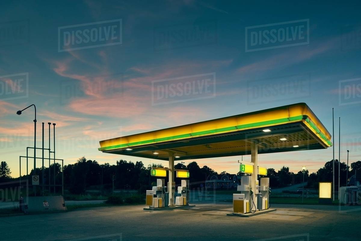 Empty gas station at dusk, Kalmar, Sweden - Stock Photo - Dissolve