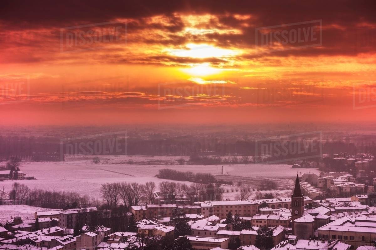 Sunset over snow covered rooftops, Cremona, Italy - Royalty-free Stock ...