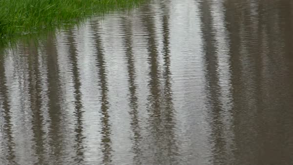 Water over road, Road flooded by overflow of a river and danger road ...