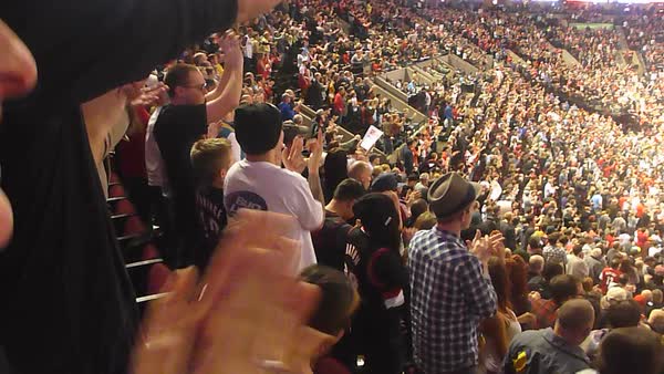 Full stadium crowd on their feet cheering and clapping. - Stock Video ...