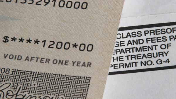 Close up on stimulus check with the maximum payment of 1200 dollars ...