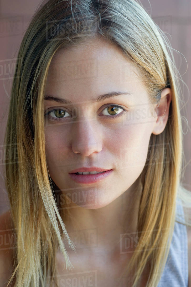 Woman looking at camera, portrait - Royalty-free Stock Photo | Dissolve