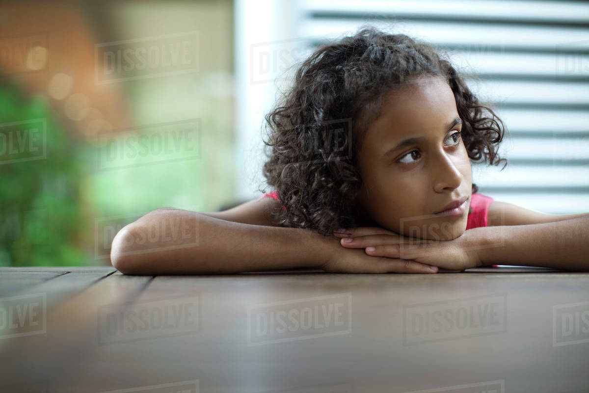 Girl daydreaming, portrait - Royalty-free Stock Photo | Dissolve
