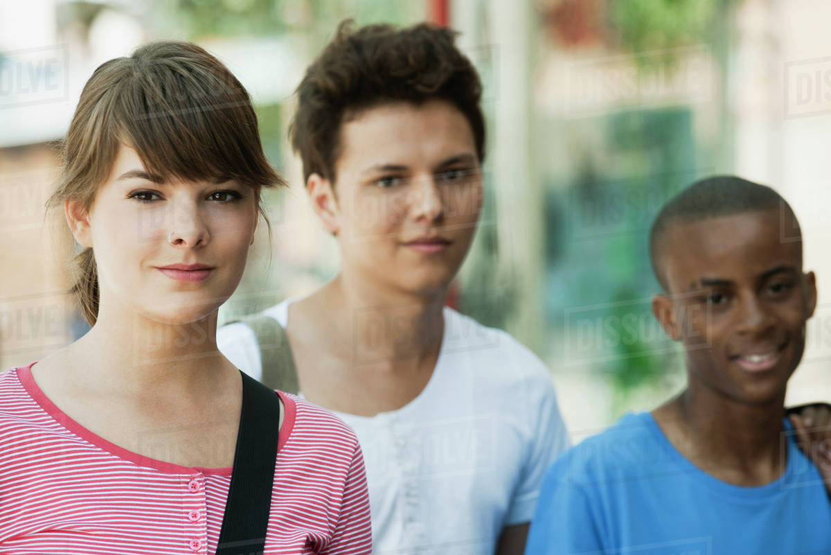 Young woman with friends - Royalty-free Stock Photo | Dissolve