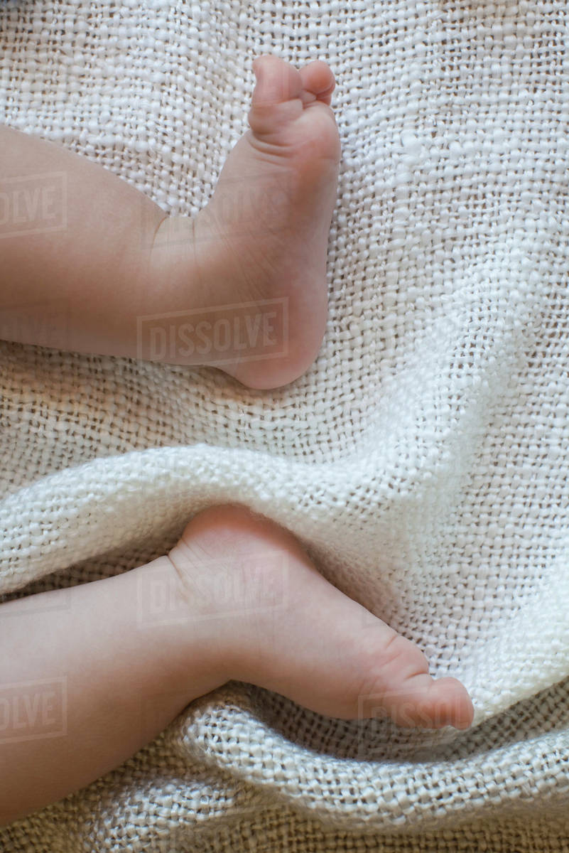 Baby's feet, directly above view - Royalty-free Stock Photo | Dissolve