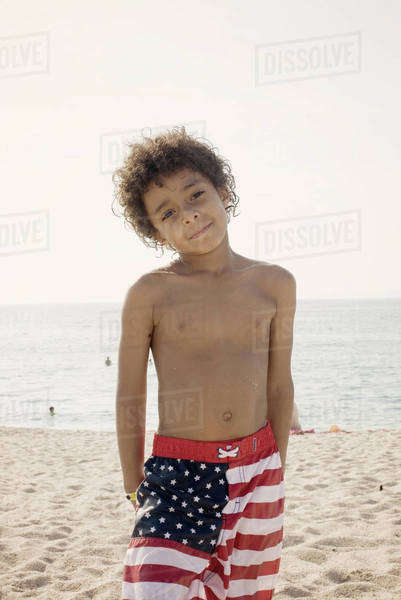 Boy at the beach, portrait - Royalty-free Stock Photo | Dissolve
