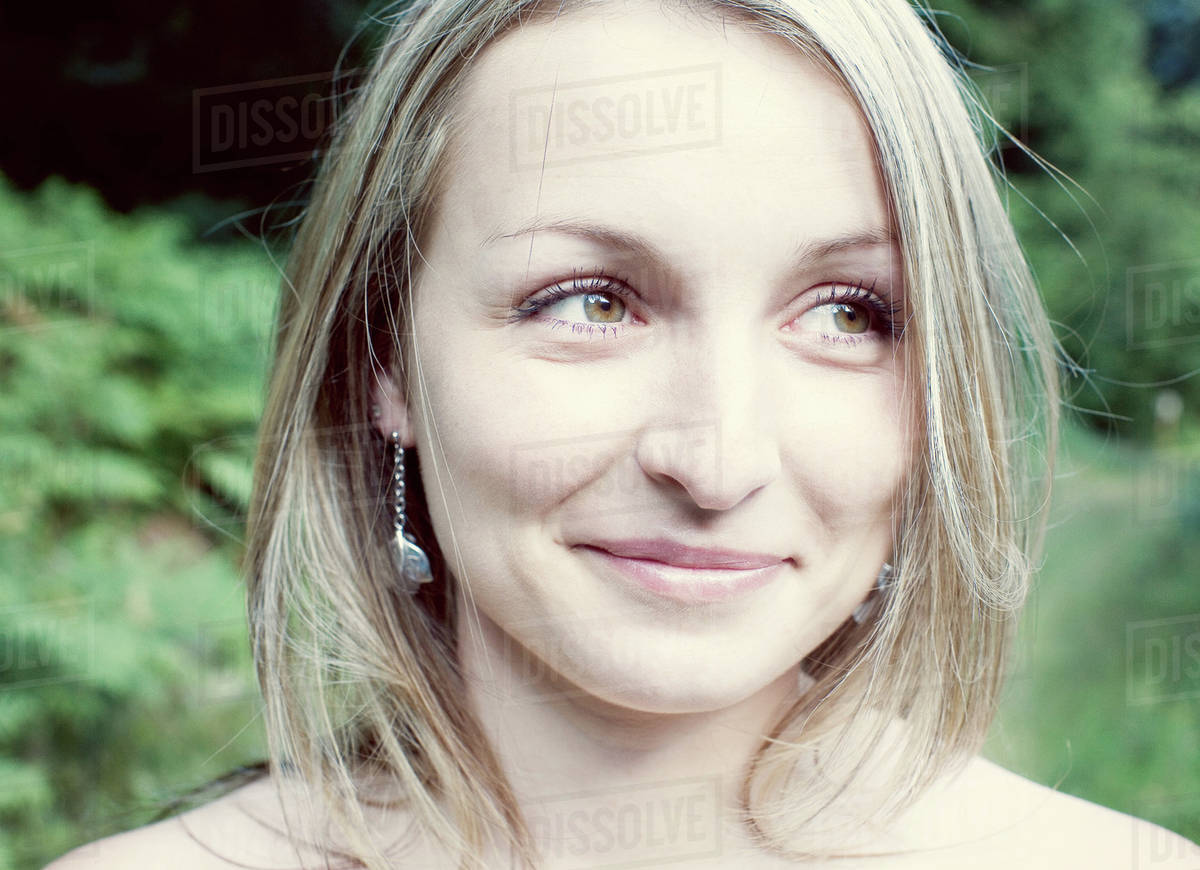 Woman smiling, portrait - Royalty-free Stock Photo | Dissolve