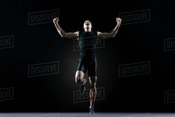 Male athlete flexing arms and shouting - Royalty-free Stock Photo ...