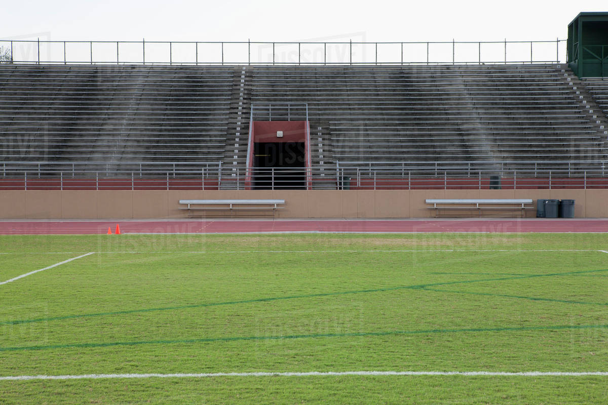 Empty stadium and track - Royalty-free Stock Photo | Dissolve