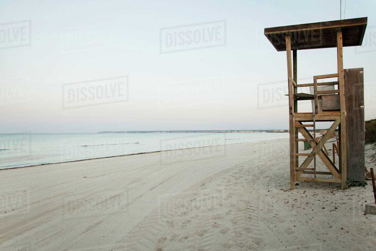 Lifeguard stand on deserted beach - Royalty-free Stock Photo | Dissolve