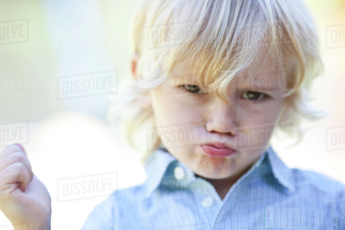 Little boy pouting - Royalty-free Stock Photo | Dissolve