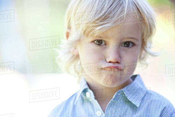Little boy pouting - Royalty-free Stock Photo | Dissolve