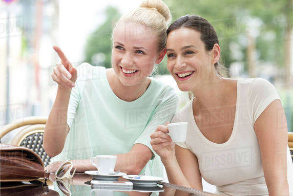 Friends gossiping - Royalty-free Stock Photo | Dissolve