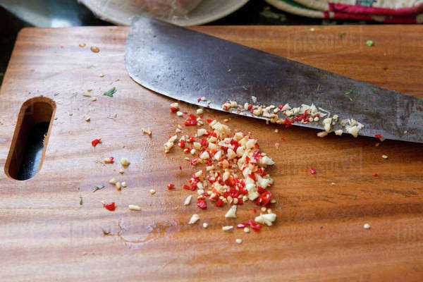 Chopped chili peppers - Royalty-free Stock Photo | Dissolve