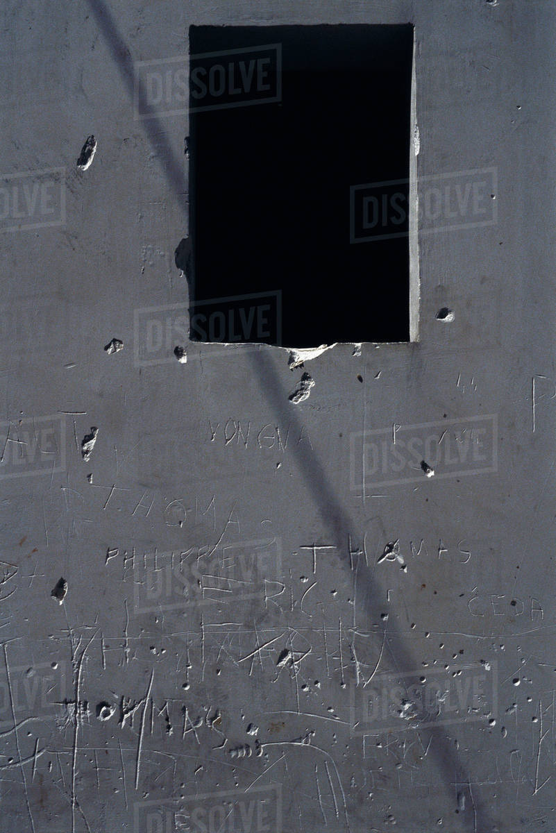 Graffiti carved into wall - Royalty-free Stock Photo | Dissolve