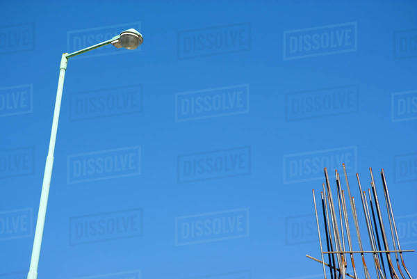 Rebar, street lamp against blue sky, low angle view - Royalty-free ...