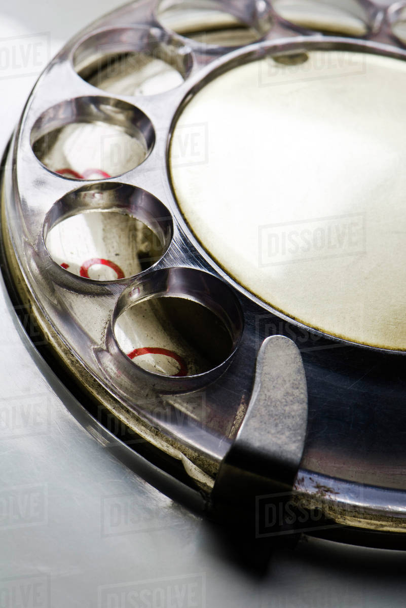 Dial of rotary telephone, close-up - Stock Photo - Dissolve