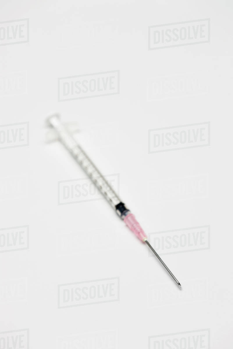 Syringe containing medication - Royalty-free Stock Photo | Dissolve