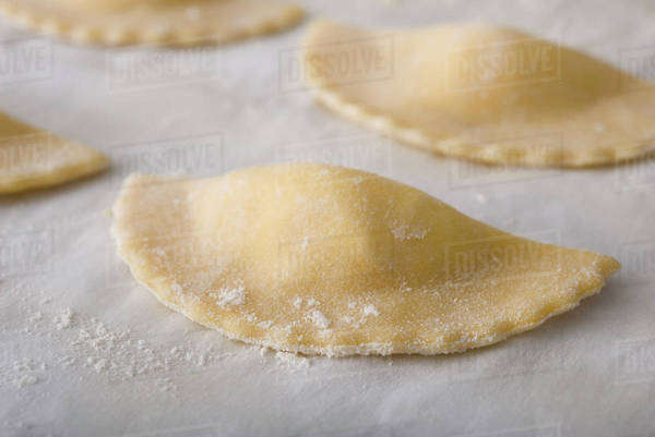 Fresh homemade mezzaluna ravioli - Royalty-free Stock Photo | Dissolve