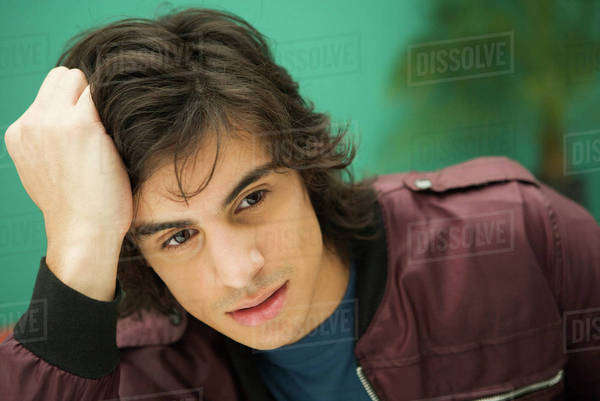 Young man contemplating - Royalty-free Stock Photo | Dissolve