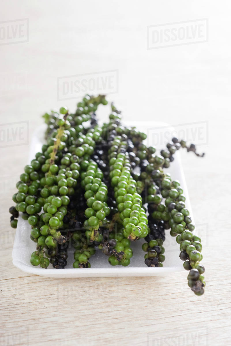 Fresh green peppercorns - Royalty-free Stock Photo | Dissolve