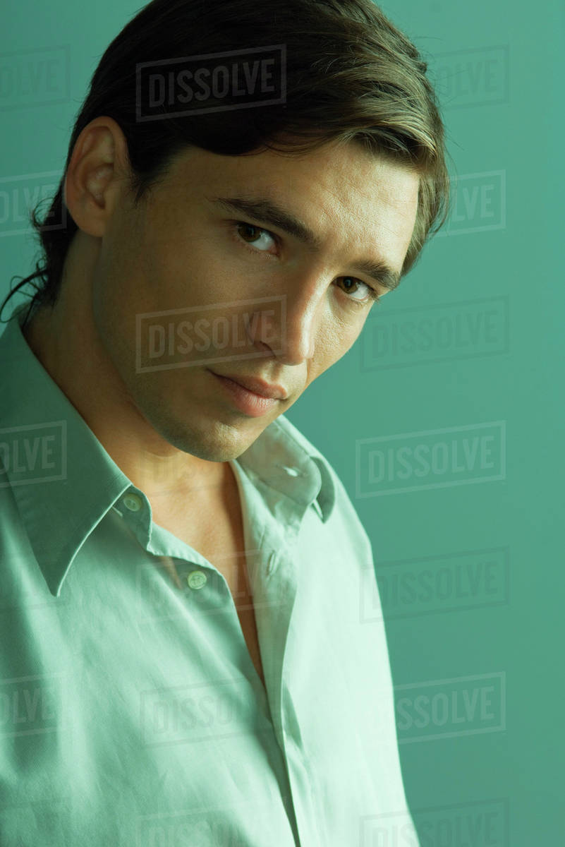 Attractive man looking seductively at camera - Royalty-free Stock Photo ...
