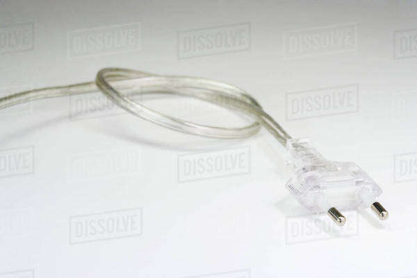 Electric cord and plug, close-up - Royalty-free Stock Photo | Dissolve