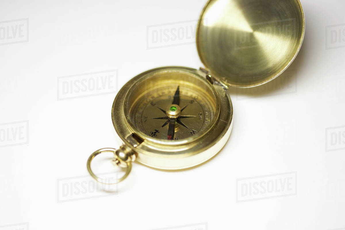 Brass compass, close-up - Royalty-free Stock Photo | Dissolve