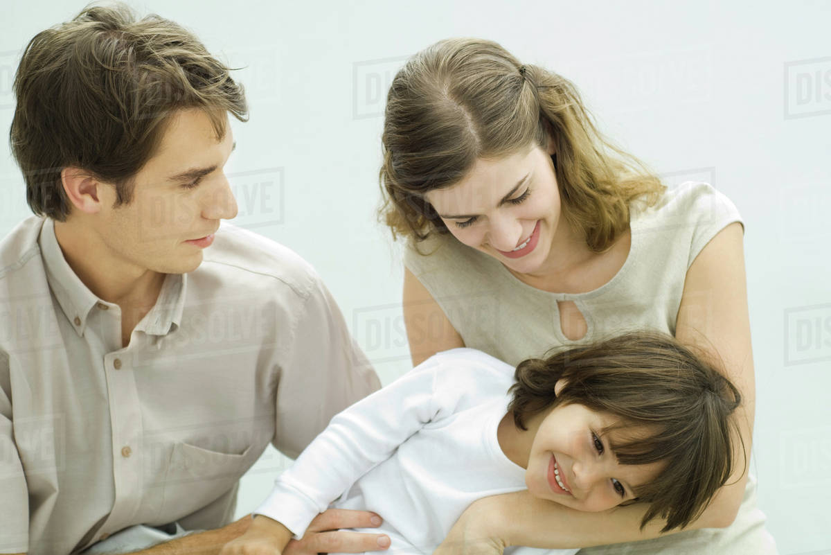 Young parents with little boy - Royalty-free Stock Photo | Dissolve