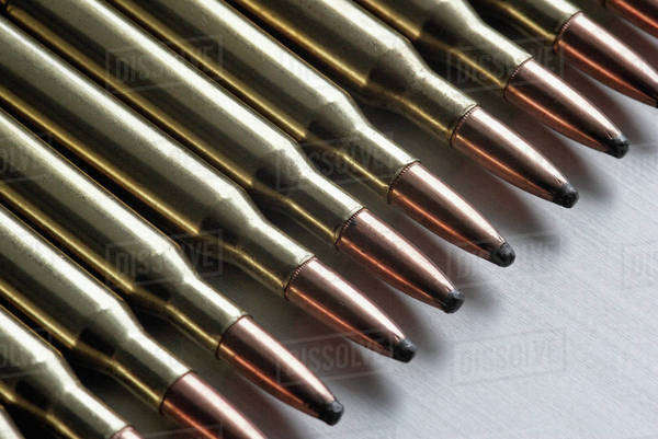 Bullets lined up, extreme close-up - Royalty-free Stock Photo | Dissolve